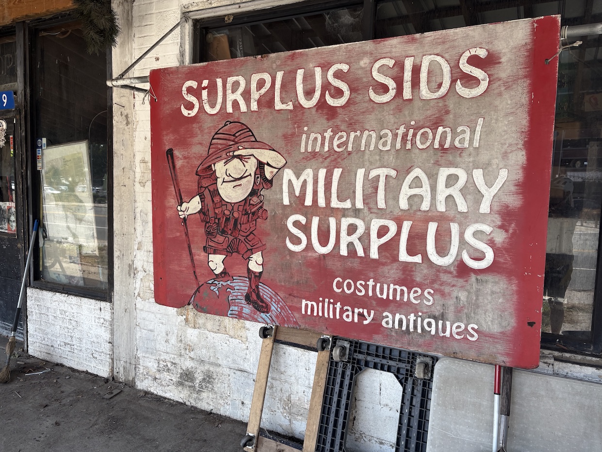 Someone has stolen the famous Surplus Sids Sign in Carrboro - Barry ...